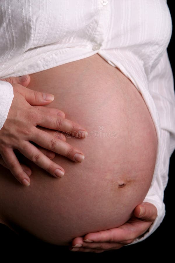 Pregnant hands and belly stock image. Image of life, pregnant - 1423745