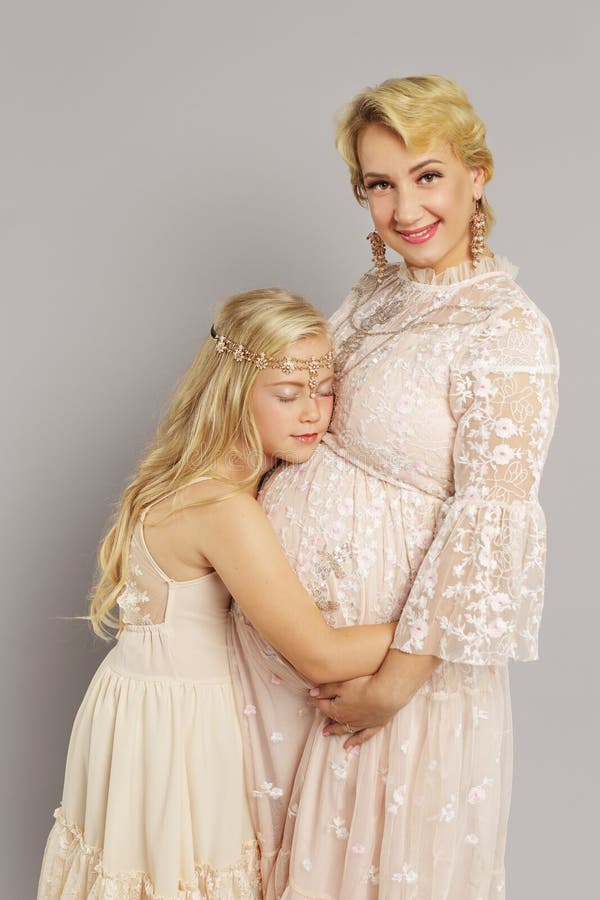Pregnant Mother With Her Daughter Stock Image Image Of Care Happy