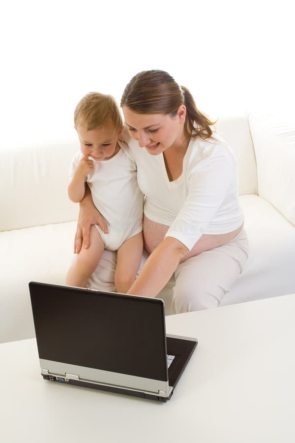 Pregnant Mother and Child Using PC Stock Image - Image of mother, table ...