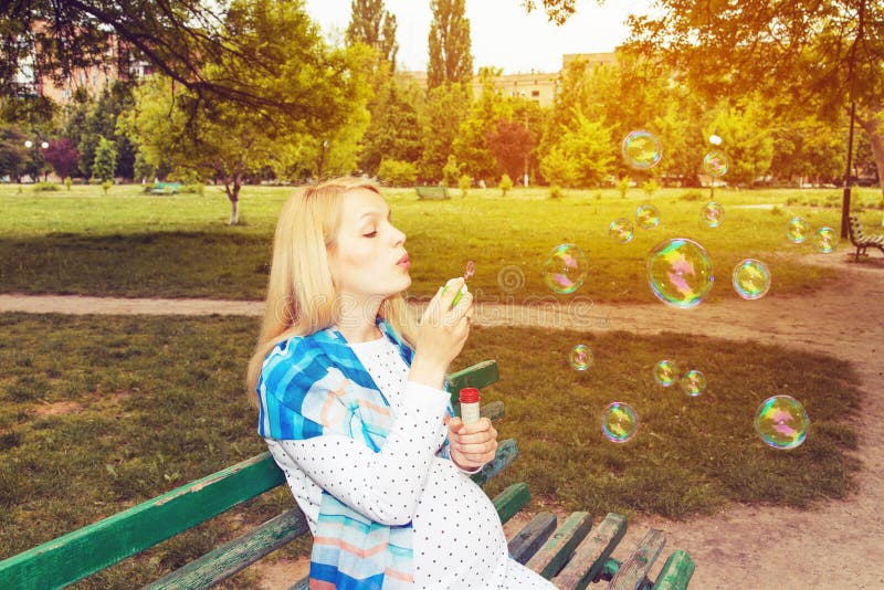 Pregnant Park Blowing Bubbles Stock Photo - Image of exercising, anticipation: 48302842