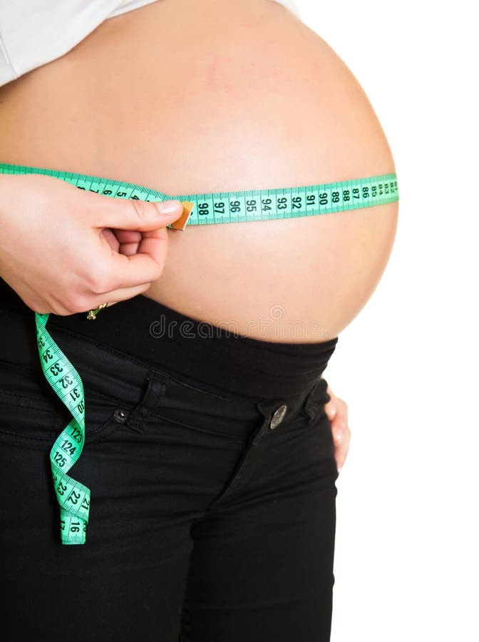 Pregnant Woman Measuring Stomach - Free Photo from StockFreeImages