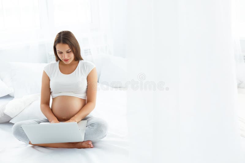 Pregnant Woman Using Laptop Computer Stock Photo - Image of laptop ...