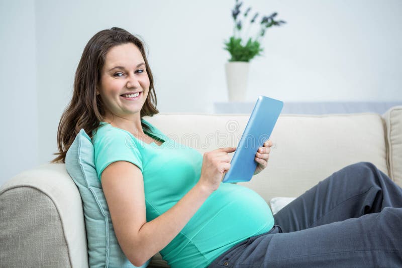 Pregnant Woman Using Tablet Stock Image - Image of belly, domicile ...