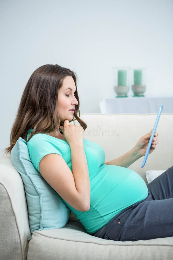Pregnant Woman Using Tablet Stock Image - Image of abode, growth: 66929659
