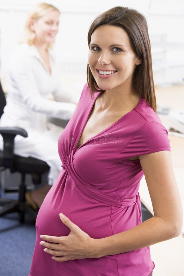 Pregnant Woman At Work Using Telephone Smiling Stock Image Image Of
