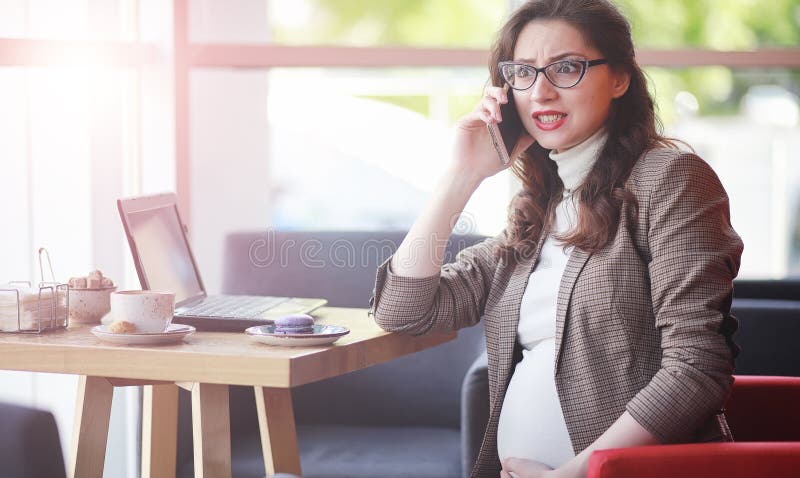 Pregnant Woman Working on Computer in Cafe Stock Photo - Image of ...