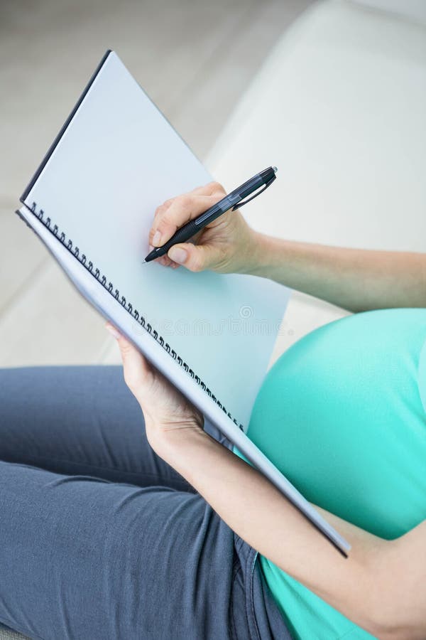 Pregnant Woman Writing on Document Stock Photo - Image of growth ...