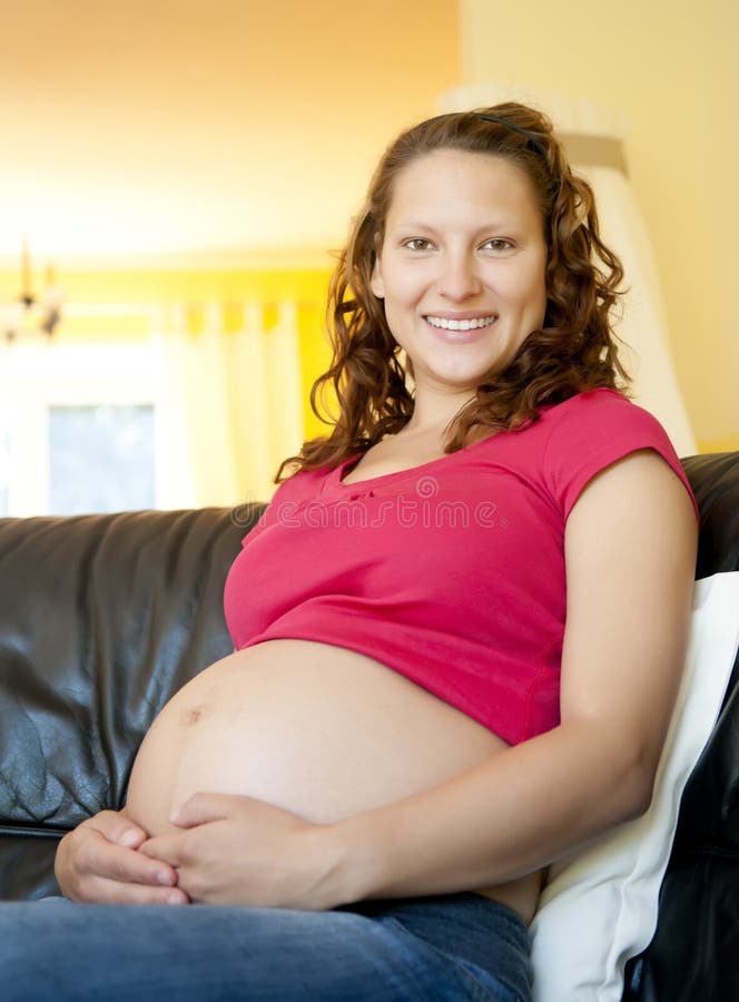 Pregnant young woman stock photo. Image of relaxing, belly - 21335996