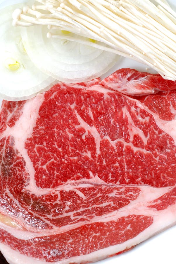 Premium beef sliced stock photo. Image of carefully, flavoring - 42753624