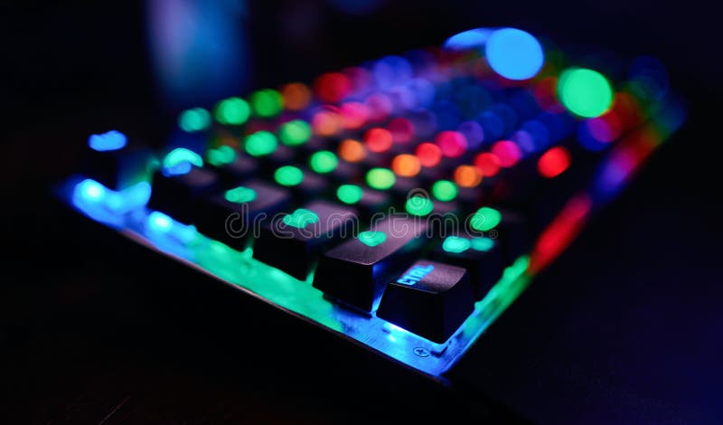 Premium Gaming RGB LED Backlit Keyboard. Mostly Blue and Purple. Front ...
