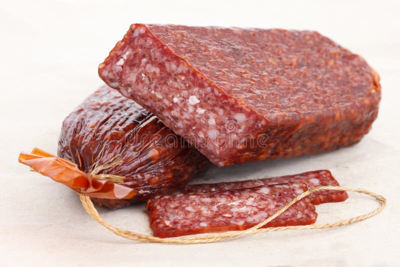 Premium Salami, Cut on Wrapping Paper. Stock Image - Image of string ...
