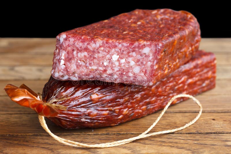 Premium Salami, Cut on Wrapping Paper. Stock Image - Image of string ...