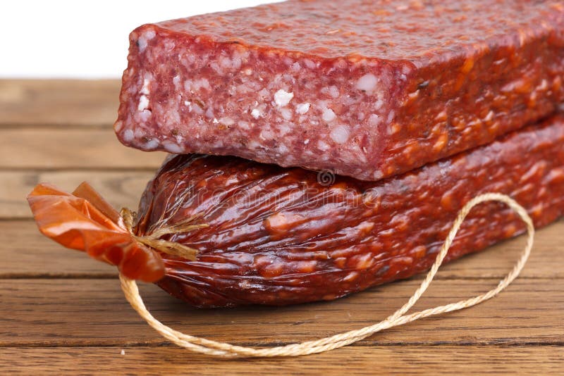 Premium Salami, Cut on Wrapping Paper. Stock Image - Image of string ...