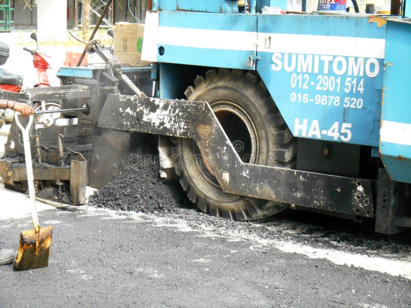 Premix Work by Construction Workers. Editorial Photo - Image of black ...