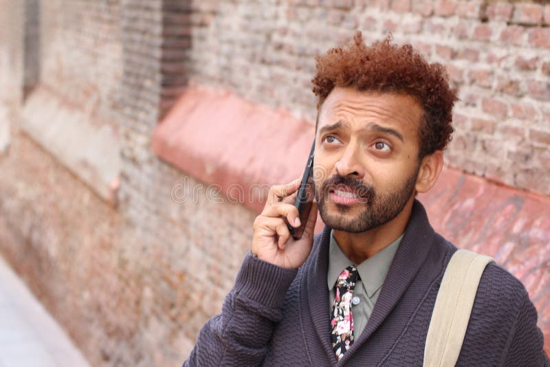 Preoccupied Man on Phone stock photo. Image of handsome - 35265874