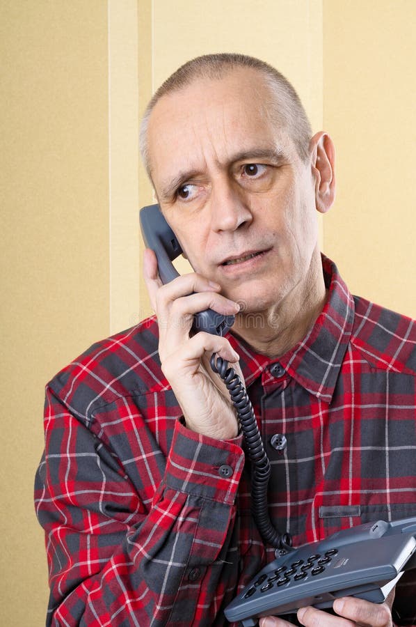 Preoccupied Man on Phone stock photo. Image of handsome - 35265874