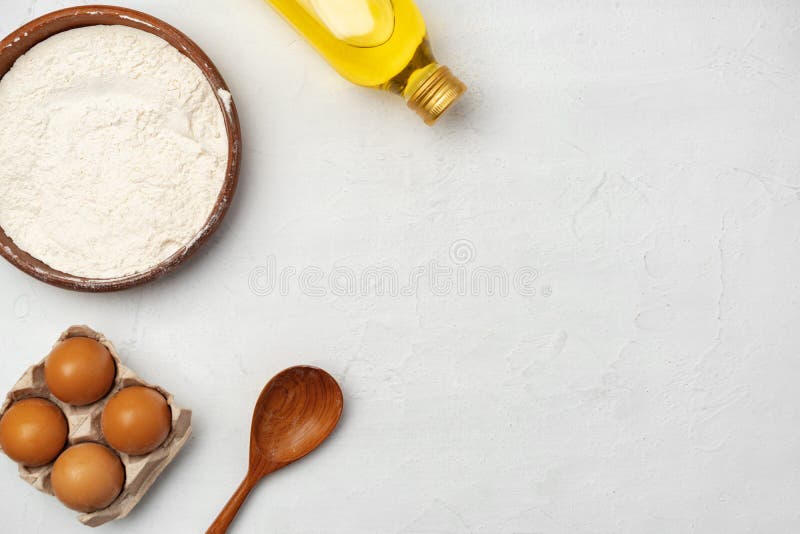 Preparation for Baking. Eggs and Flour on White Background Stock Image ...