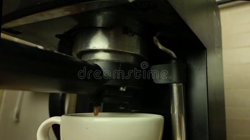 Preparation of Coffee from the Coffee Machine. Slow Drops of Coffee ...