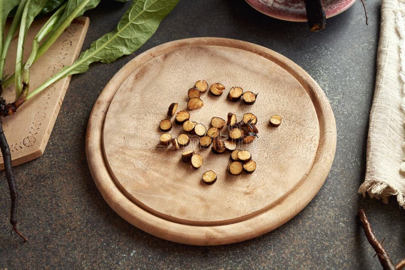 Preparation of Comfrey Root Tincture - Slicing the Root Stock Image ...