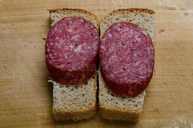 Cold Cuts with Sausage and Bread Stock Image - Image of slicing, table ...