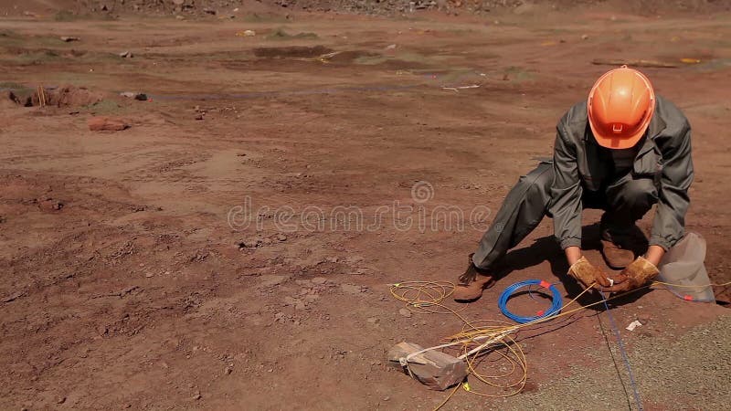 Explosives Work in a Quarry. the Process of Placing Explosives in an ...