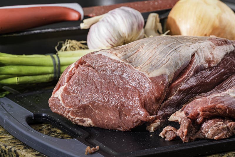 Preparation with Fresh Beef Tenderloin Over the Sink Stock Photo ...