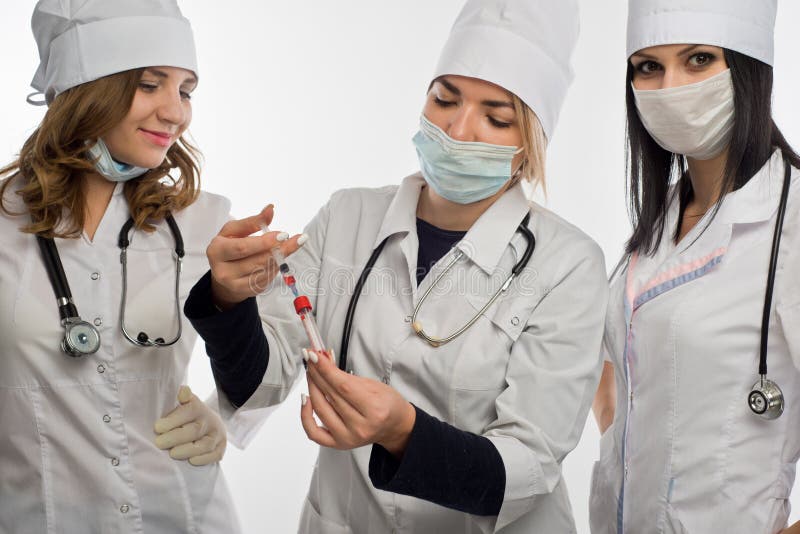 Preparation for Giving an Injection by the Young Health Workers Stock ...