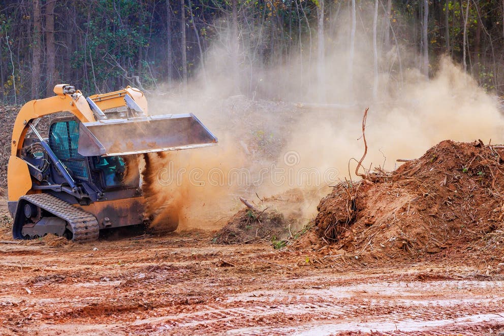 In Preparation for Grading Soil, Bulldozer is Leveling Ground on a ...