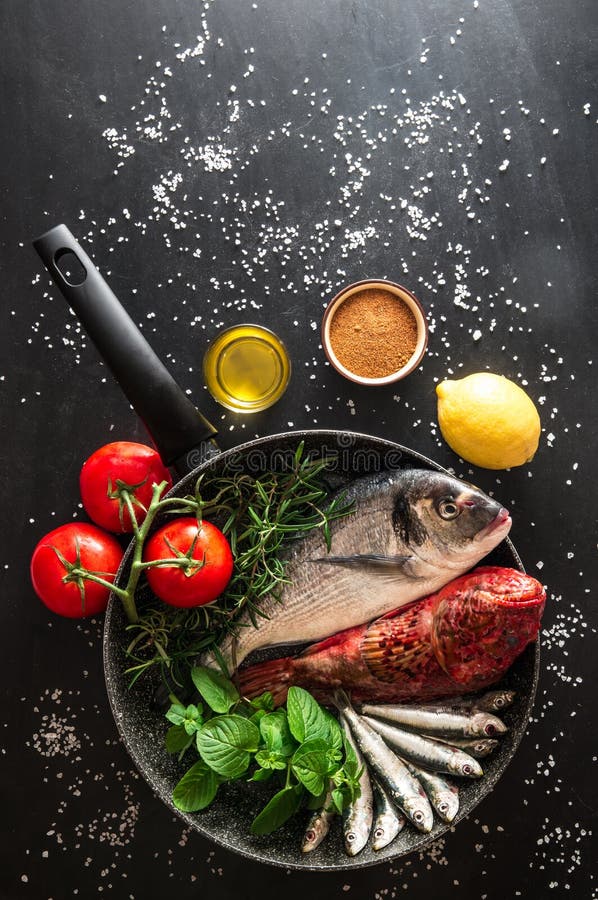 Preparation of a Grilled Fish Stock Image - Image of fresh, blackboard ...