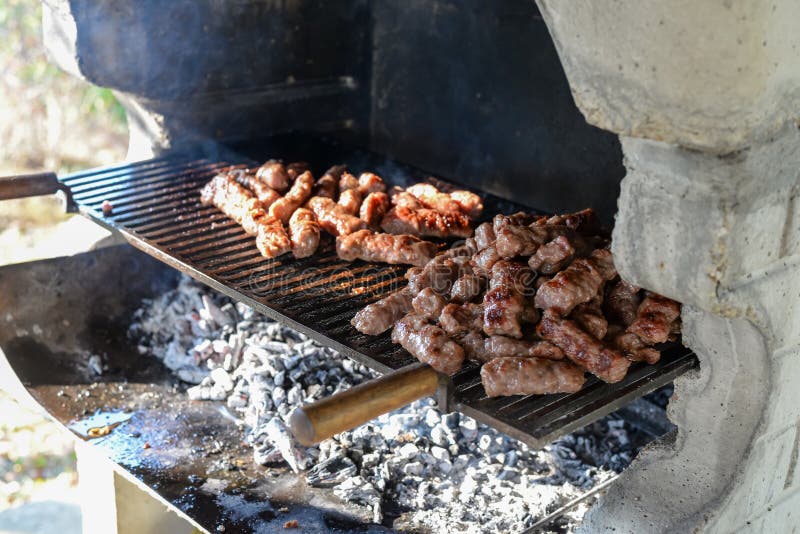 Preparation of Meat on Grate of a Brick Grill Stock Photo - Image of ...