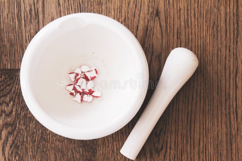 Tablets in a Mortar Being Crushed with Pestle for a Compound Stock ...