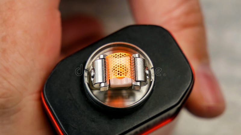 Preparation of Mesh Coil in the Atomizer for Vaping - Slightly Glowing ...