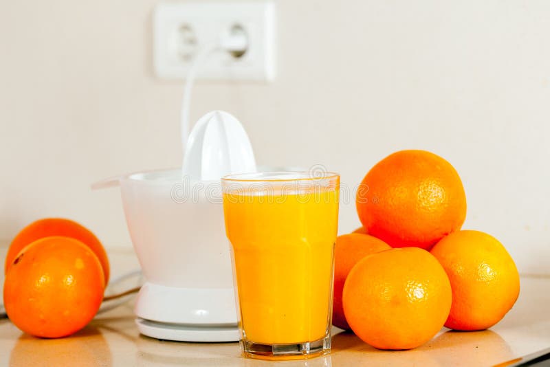 Preparation of Orange Juice Stock Image - Image of juicer, glass: 57864361