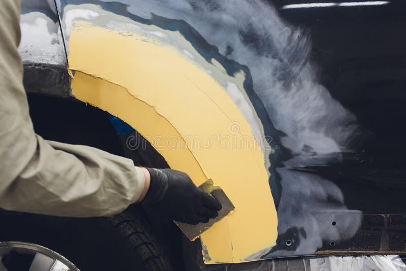 Preparation for Painting a Car Element Using Emery Sender by a Service ...