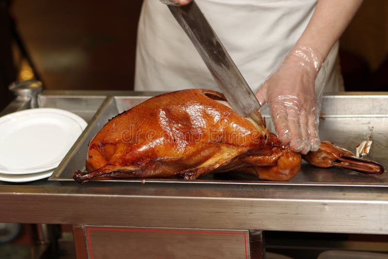 Preparation of Peking Duck stock photo. Image of asian - 13814480