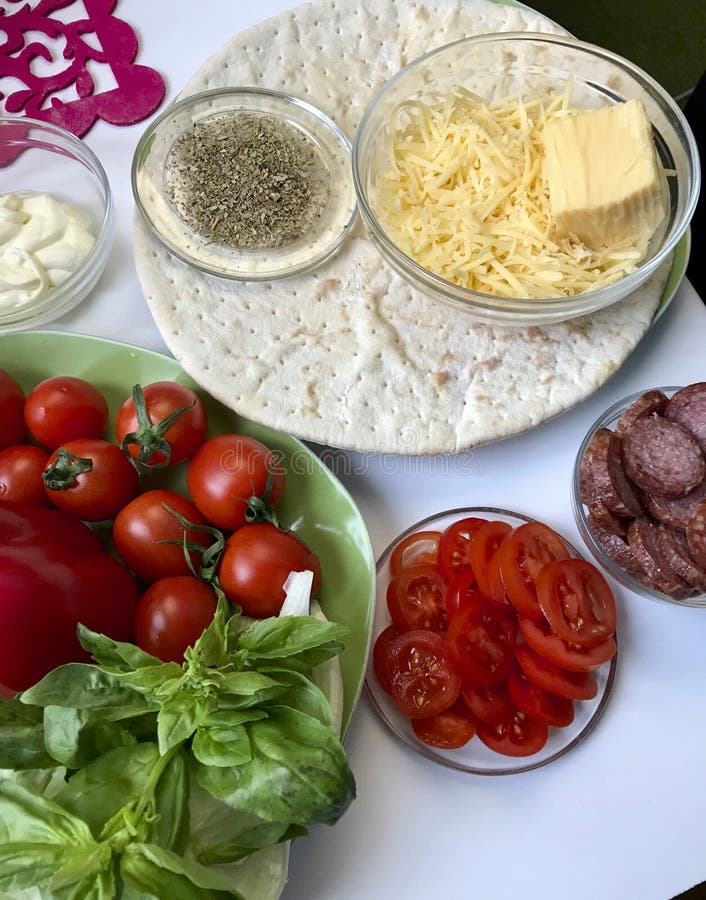 Preparation of Pizza. Necessary Ingredients are on the Table: Cheese ...