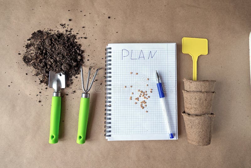 Preparation for Planting Seeds at Home. a Notebook with a Record of the ...