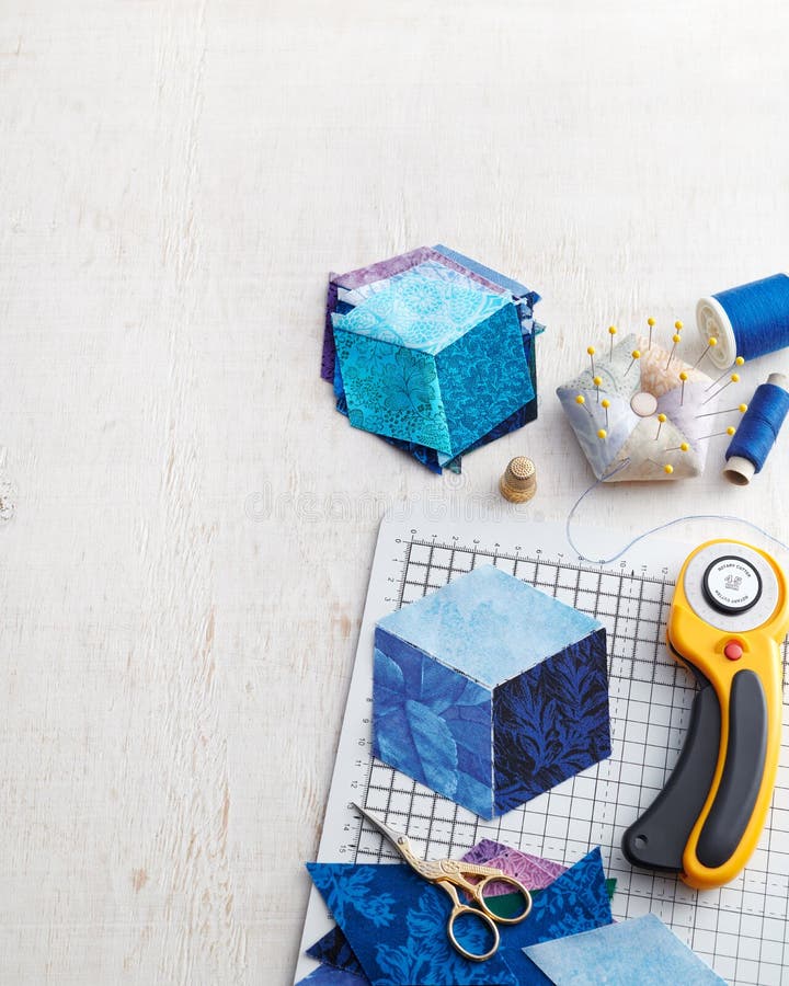 Preparation for Sewing a Cube from Rhombuses, Pile of Stitched Cubes ...