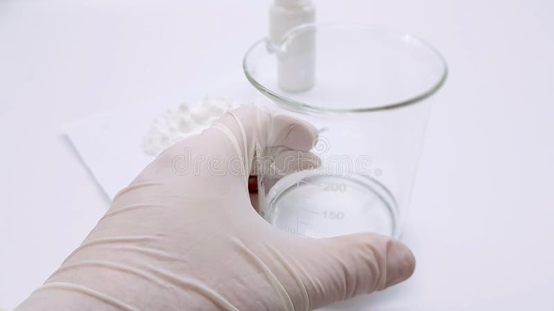 Preparation of a solution stock image. Image of erlenmeyer - 137948437