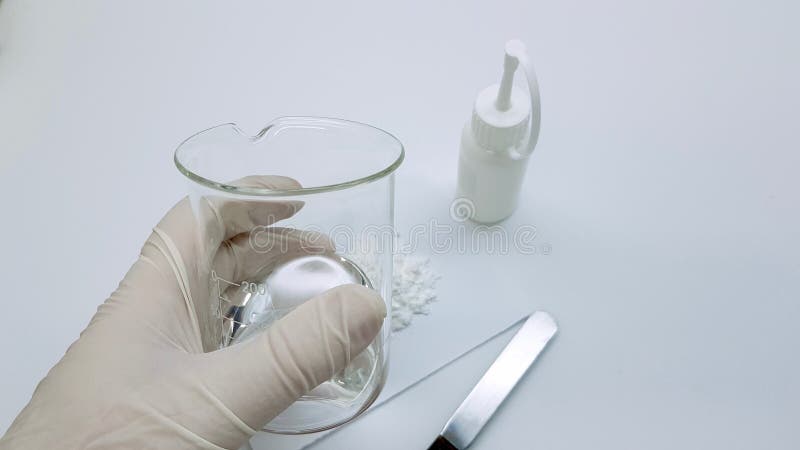 Preparation of a solution stock photo. Image of glass - 137948438