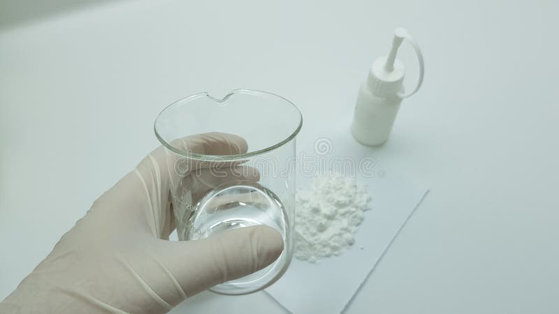 Preparation of a solution stock image. Image of erlenmeyer - 137948437