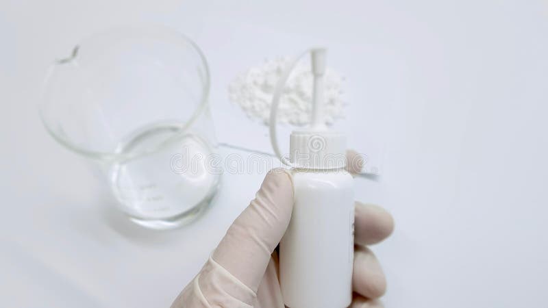 Preparation of a solution stock image. Image of erlenmeyer - 137948437