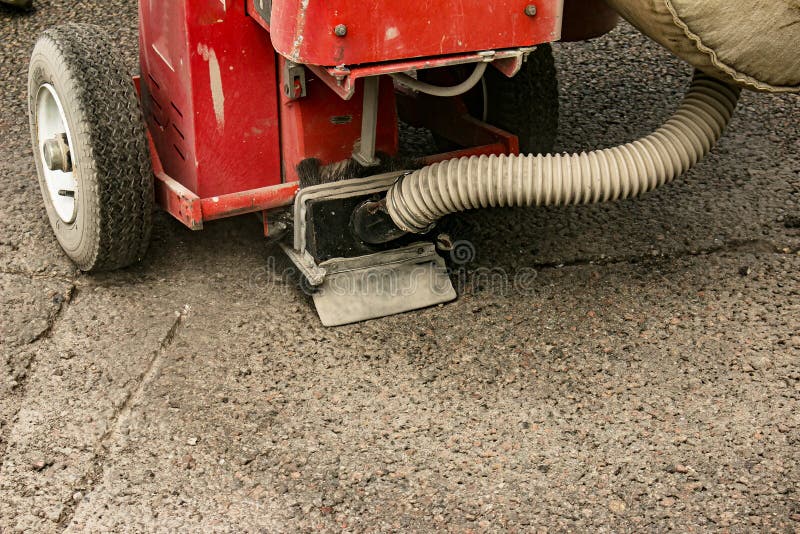 Preparation of the Surface for Laying Asphalt Pavement. Removal of ...