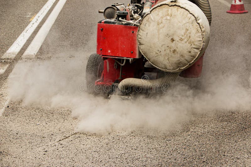 Preparation of the Surface for Laying Asphalt Pavement. Removal of ...