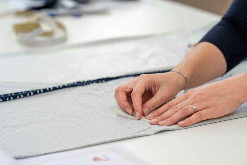Preparation of a Template for Making a Dress in a Tailors Shop Stock ...