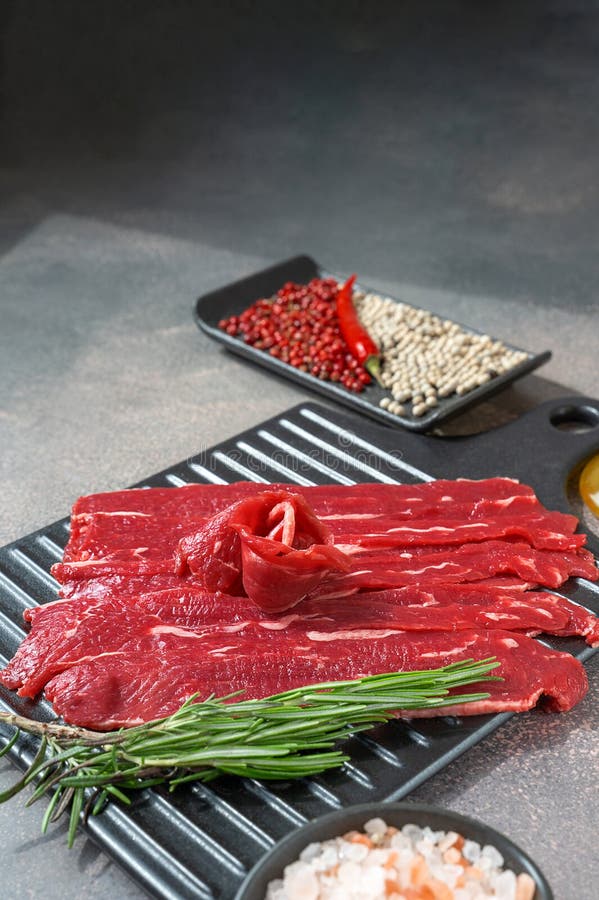 Preparation of Thinly Sliced Beef Accompanied by Colorful Spices and ...