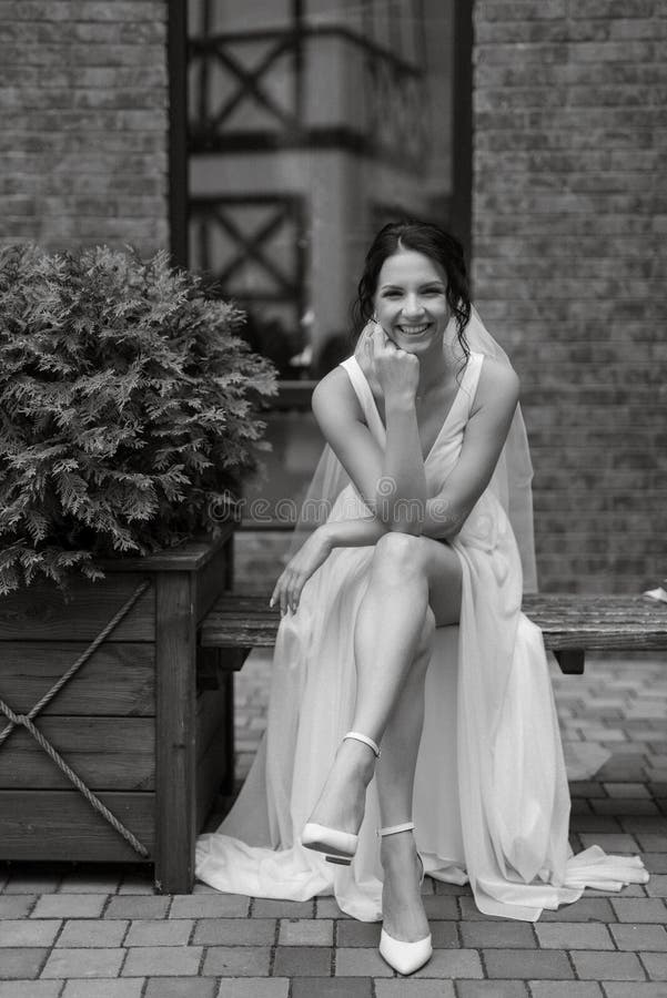 Preparations for the Bride with the Dressing of the Wedding Dress Stock ...