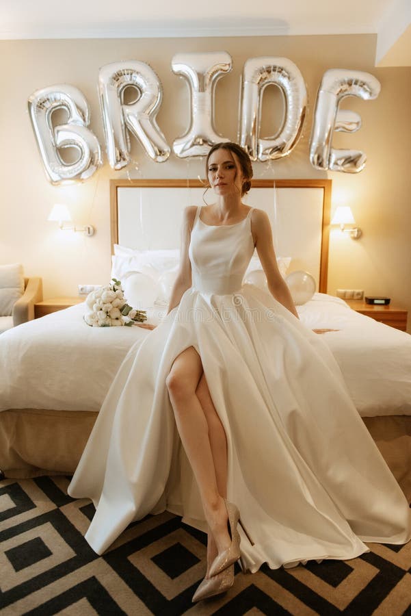 Preparations for the Bride with the Dressing of the Wedding Dress Stock ...