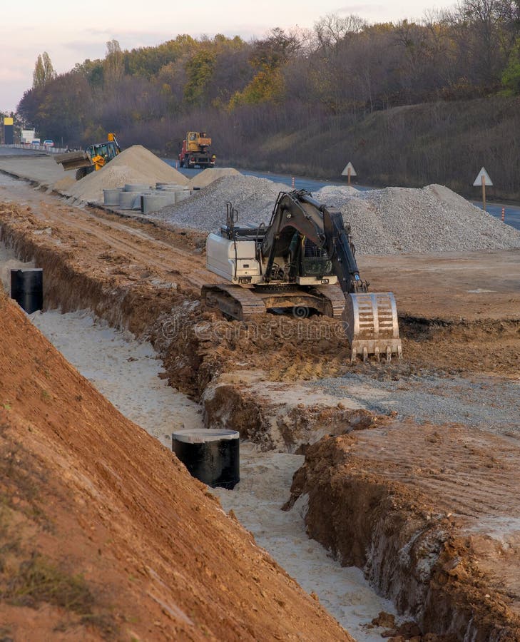The Construction of the Road. Works Construction Equipment. Stock Photo ...