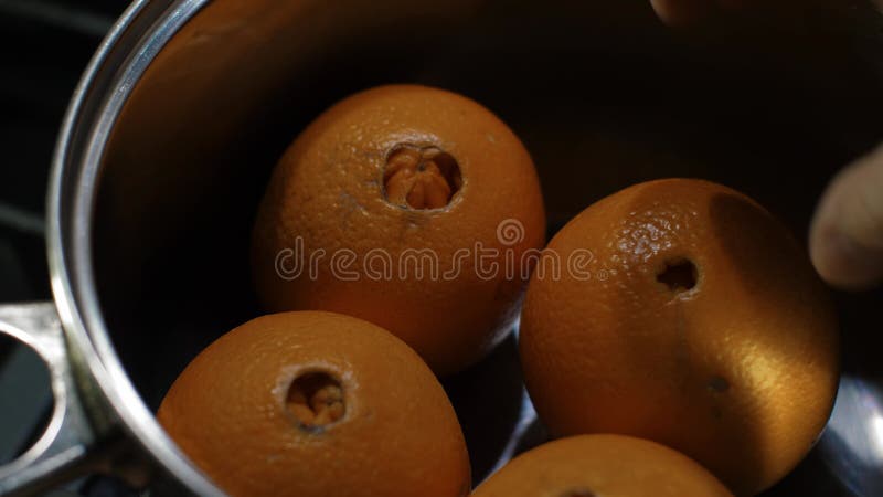 Oranges in Pot stock footage. Video of dish, cook, food - 377064840